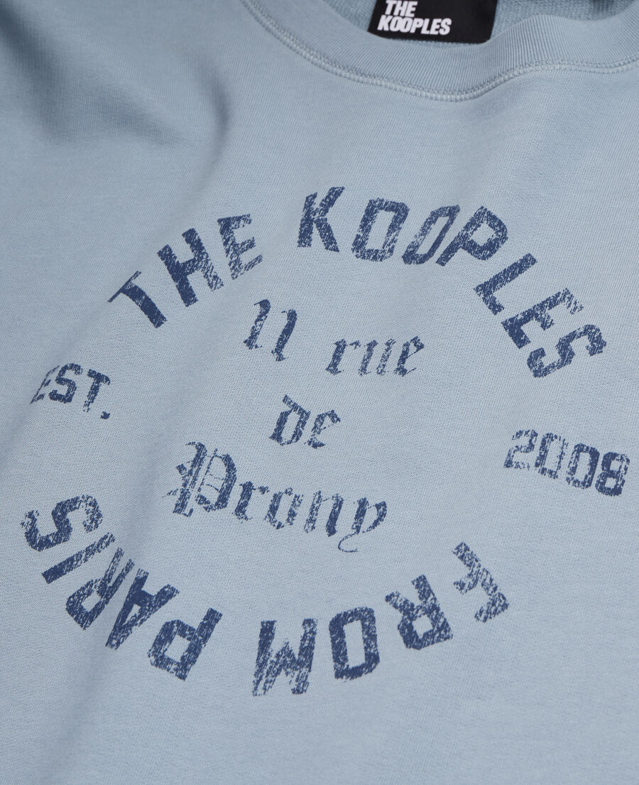Light blue sweatshirt with 11 Rue de Prony serigraphy | The Kooples